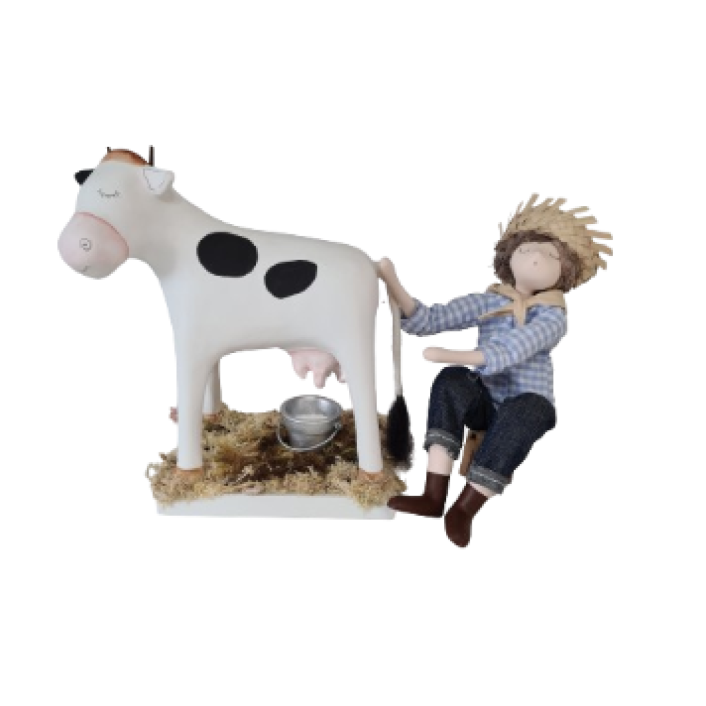 VACA E MENINO TIRANDO LEITE